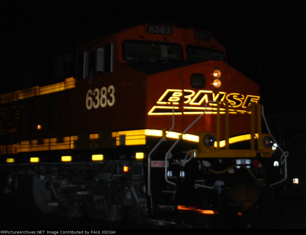 BNSF 6383 rolls south as a rear DPU unit on a loaded coal train with BNSF 6381 in front of her.